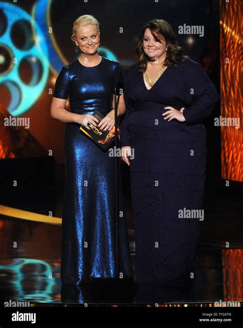 Actresses Amy Poehler L And Melissa Mccarthy Present During The 63rd