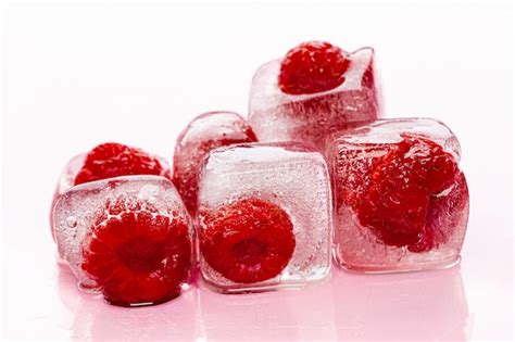 Premium Photo Raspberry Ice Cubes On Pink Glossy Background Premium Photo Raspberry Ice Cubes On Pink Glossy Background