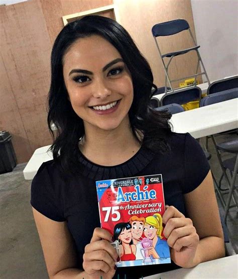 Cami Holding An Archie Comic Scrolller