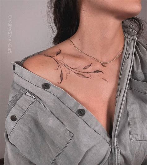 Freehand Leaves Tattoo On The Collarbone