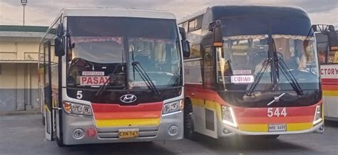 Two First Class Buses Awaiting For Their Night Trip Rbus
