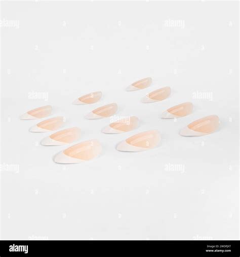 Realistic Set Of Colored False Nails Adhesive Isolated On White