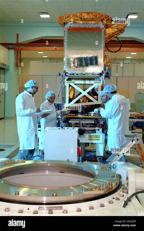 Global Navigation Satellite Engineers Performing Checks On The Platform Of One Of The Giove