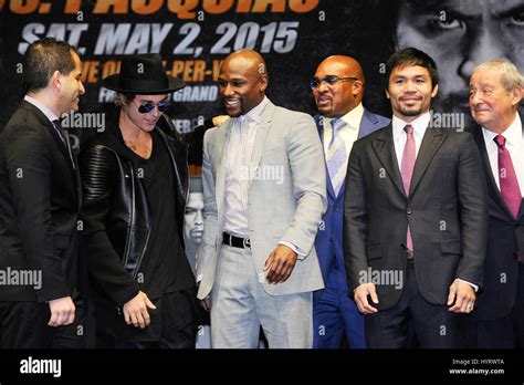 L R Singer Justin Bieber Boxers Floyd Mayweather Jr Leonard Ellerbe