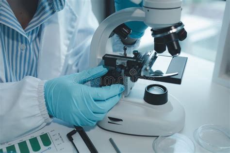 Chemist Is Doing An Experiment In The Laboratory A Scientist Is Using