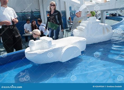 Large Styrofoam Floats Covered In Orange Plastic And Tied Together By