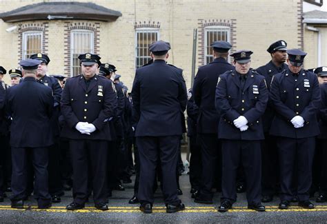 Nypd Back Turning Protests Continue At Funeral For Slain Officer Newsweek
