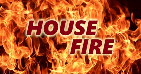 Emergency Personnel Responding To Working House Fire In Cressona