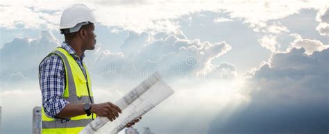 Engineers With Draft Plan Of Building On Constructing Site Engineer