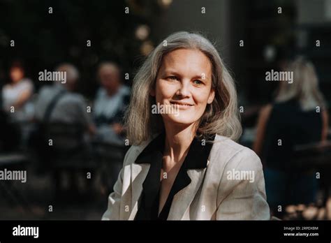 Portrait Of Beautiful Female Manager In Middle Age With Gray Hair Stock