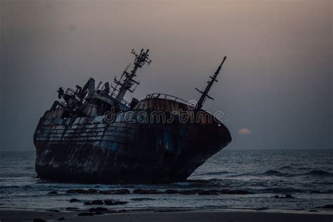 Beautiful Shot Of A Historic Dirty Old Ship After A Shipwreck On A Seashore Stock Image Image