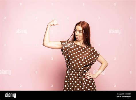 A Redhead Girl With The Biceps A Strong Girl With Beautifull Red Hair