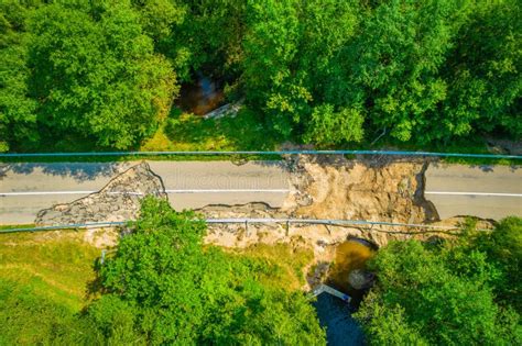 The Road And Bridge Washed Out And Destroyed After The Heavy Rain And