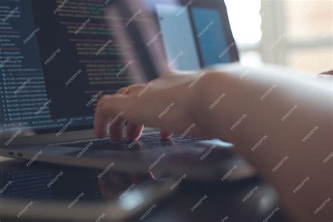 Premium Photo Programmer Software Developer Coding Html Program Javascript On Laptop Computer