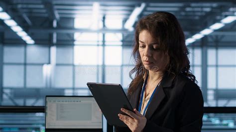 Technician In Data Center With Tablet Integrating Ai Driven Automation Tools Stock Image Image