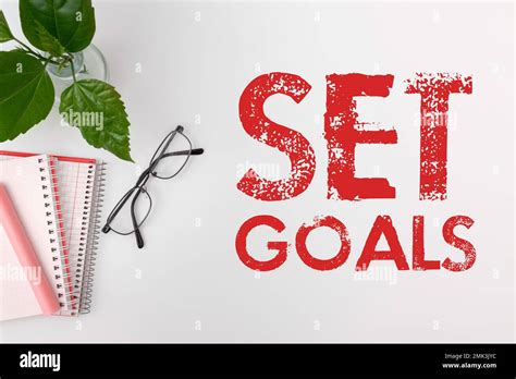 Text caption presenting Set Goals. Business overview Defining or achieving something in the ...