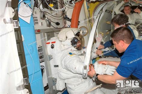 Astronauts Mike Foreman Left And Rick Linnehan Background Both Sts 123 Mission Specialists