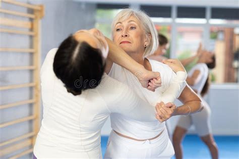 Woman Doing A Head Kick During Self Defense Training Stock Image Image Of Pair Exercising