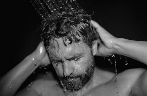 Millennial Man Washing Hair In Bath Guy Bathing Shower Head In Bathtub