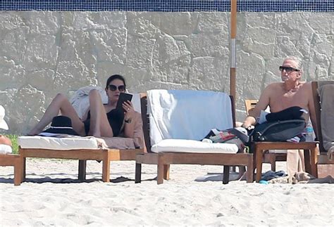 Catherine Zeta Jones Bares Her Butt And Cleavage In A Plunging Bikini