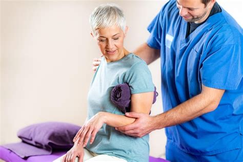 Premium Photo Male Chiropractor Doing Chiropractic Adjustment Of