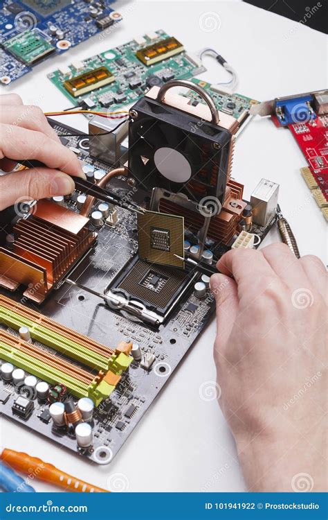 Technician Plug In Microprocessor To Motherboard Stock Photo Image Of