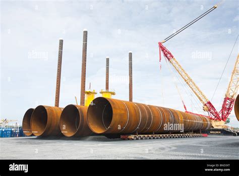 Monopiles Waiting To Be Sunk Into The Seabed To Support Offshore Wind