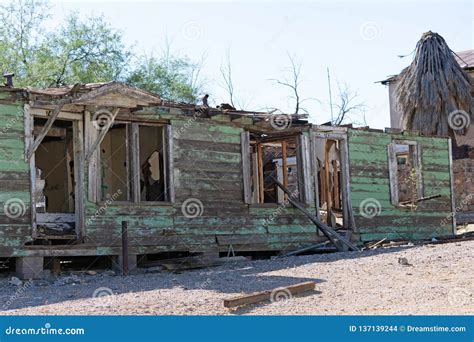Old Collapsed Ruin And Abandoned House In The Jungle Overgrown With