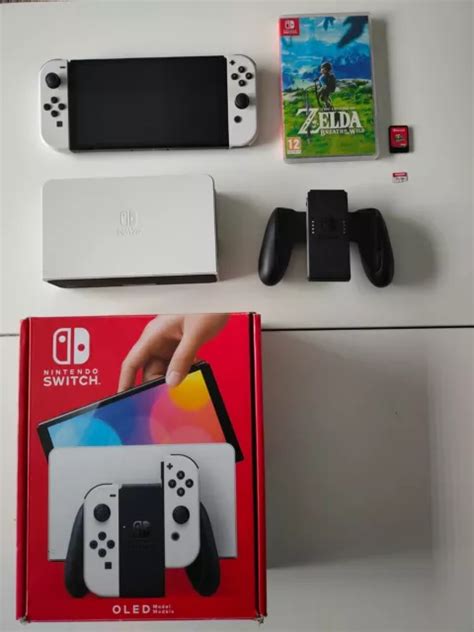 Nintendo Switch Oled Model With Zelda Botw And Super Mario Odyssey Games