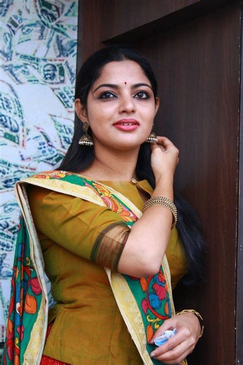 My Film And Its Stories Indian Actress Nikhila Vimal Hot Stills In Yellow Dress