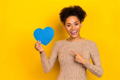 Photo Of Impressed Millennial Brunette Lady Index Heart Wear Sweater