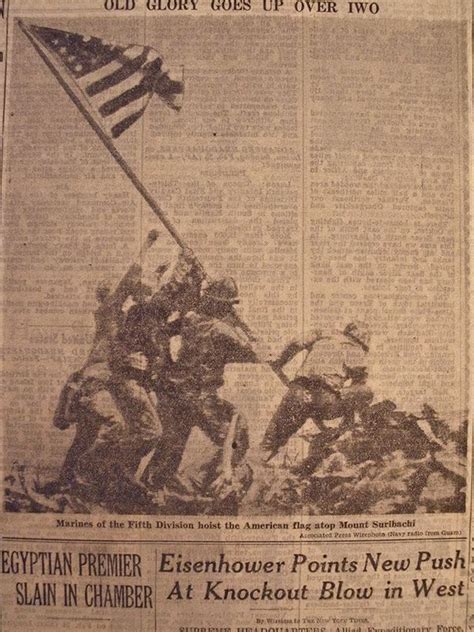 Up Close Newsprint Picture Of The Flag Raising And The Six Soldiers In