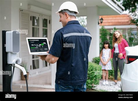 Qualified Technician Working On Home Ev Charging Station Installation