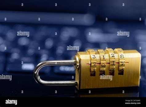 Cyber Safety Or Security Encryption Concept Code Numbers Pad Lock On Laptop Computer Stock