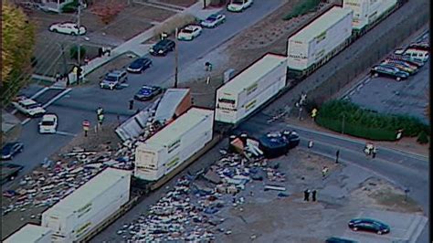 Crash Between Train Tractor Trailer Flings Debris Into Intersection
