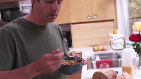 365 Man Eating Cereal In Kitchen Stock Videos Footage And 4k Video