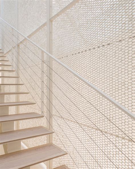 Kengo Kuma Divides Archives Antoni Clavé With Mesh Screens Dappled With