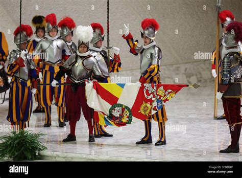 The Swiss Guard Seen Taking An Oath Of Office While Holding The Flag Of