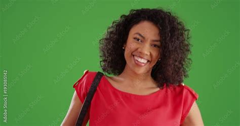 Vidéo Stock Beautiful Black Woman With Radiant Smile Twirling On