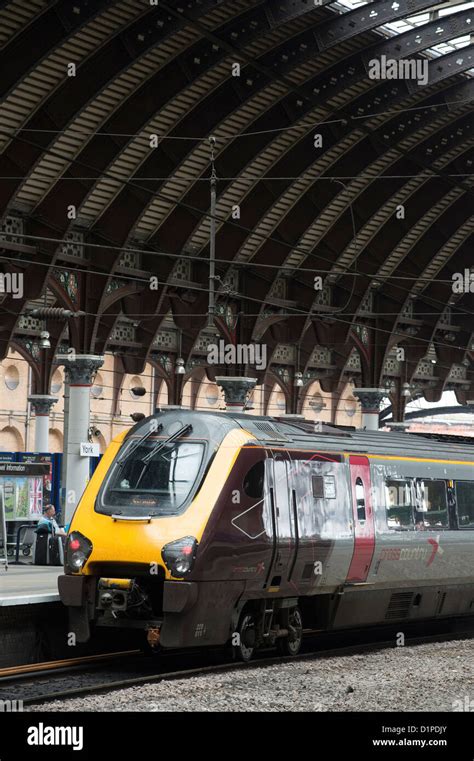 Class 220 Voyager Passenger Train In Crosscountry Livery Waiting At A