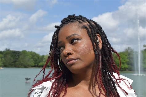 Exceptionally Beautiful Plus Sized Woman Of Color With Partially Red