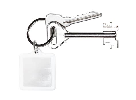 Premium Photo Bundle Of Keys With Blank Keychain Isolated