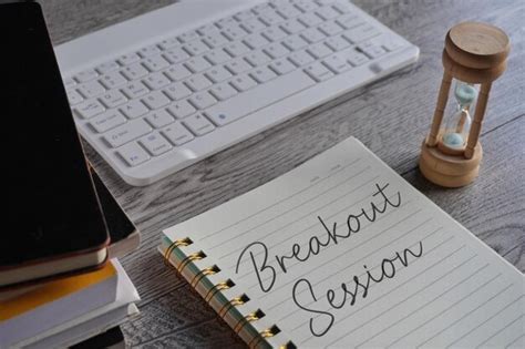 premium photo closeup image of notebook with text breakout session on