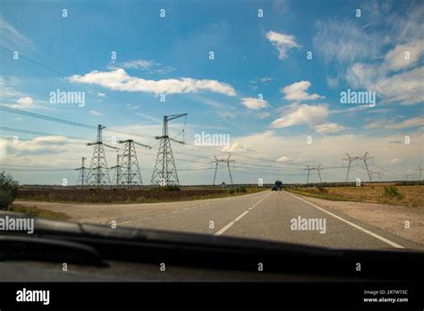 Power Transmission Tower In Ukraine In Summer Overhead Wires Of High Voltage Power Transmission