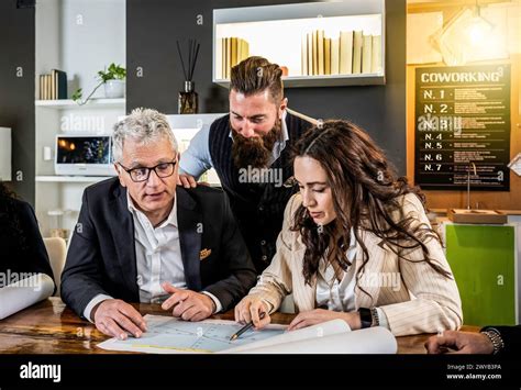 Collaborative Team Analyzing Strategy In Modern Coworking Space