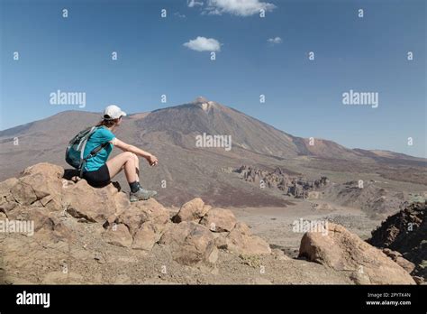 Tourist Girl Next To Peak Of Mount Teide Called Pico Del Teide View Of The Caldera And