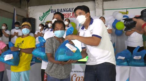 Mcgi Hands Goods To The Natives Of Alabat Quezon Philippines Mcgi