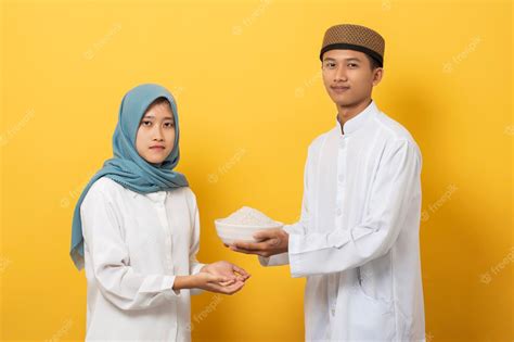 Premium Photo Giving Alms Or Charity Concept Young Muslim Man Give
