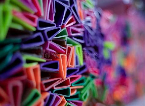 Background Of Colorful Abstract Texture With Plastic Triangles Stock