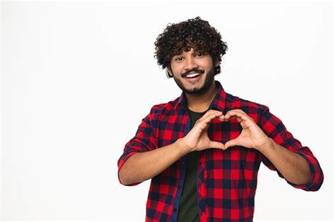Cheerful Young Indian Man Having Romantic Mood Isolated Over White